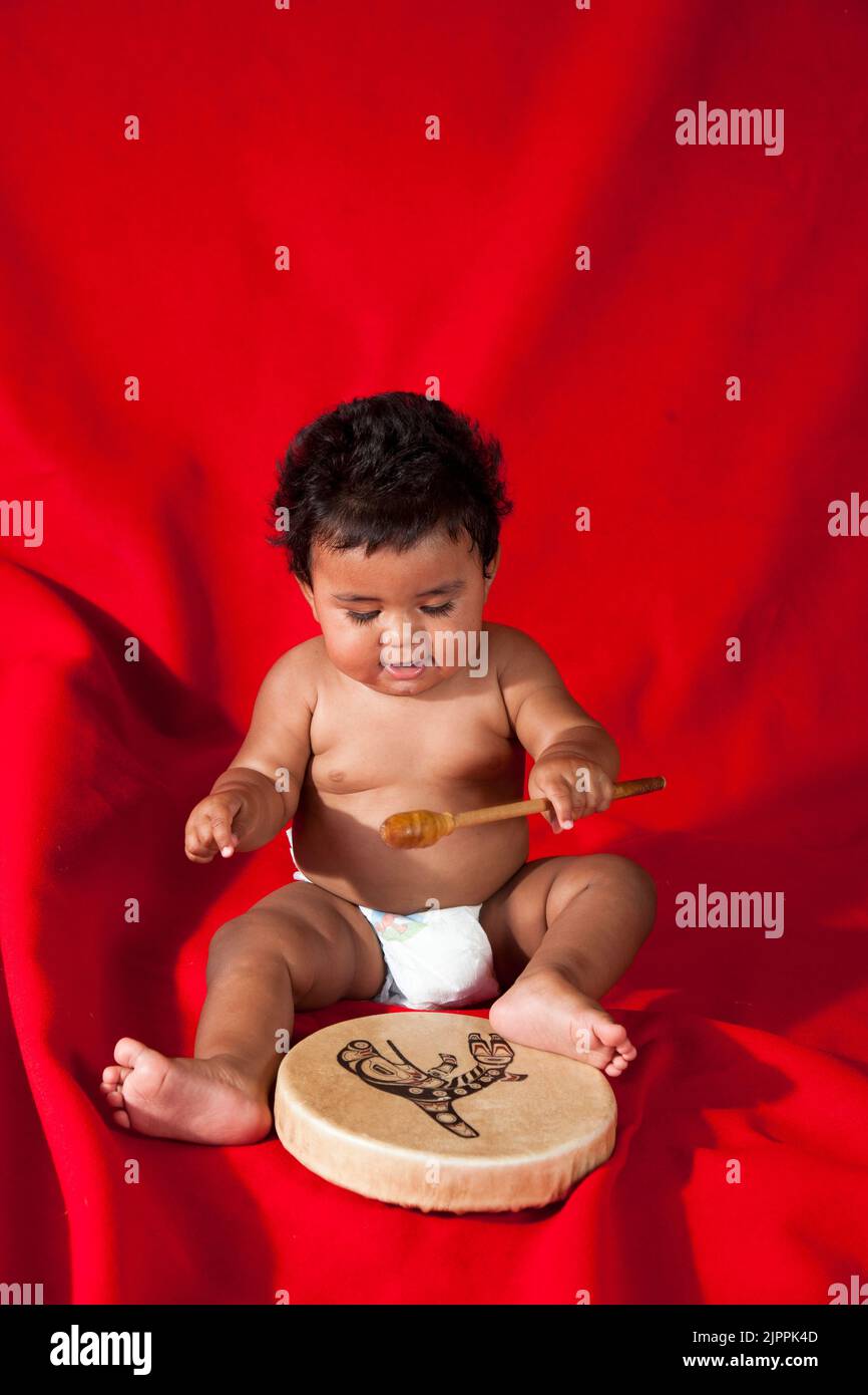 Native American baby, from the Santa Clara Pueblo in New Mexico, plays ...