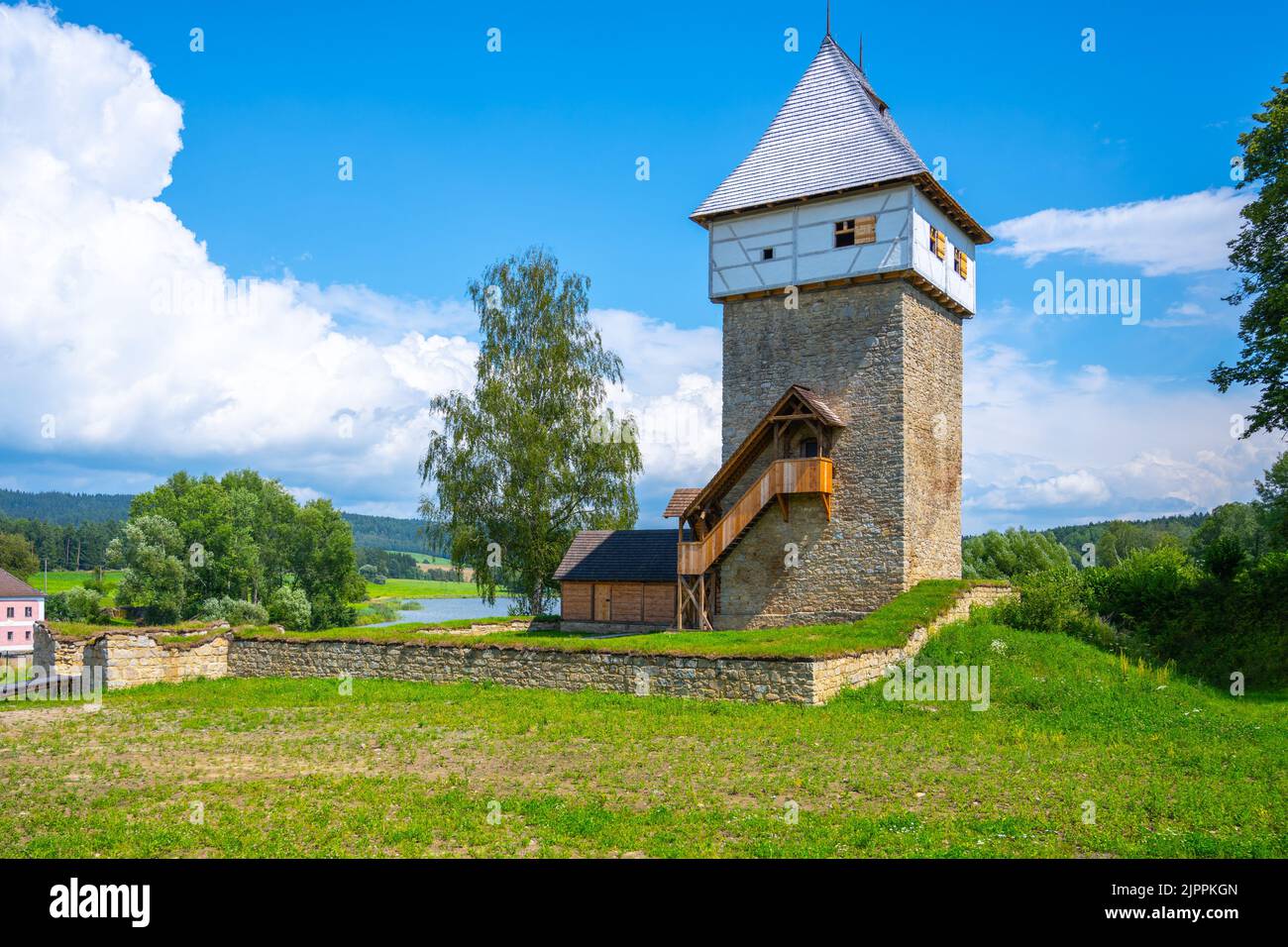 Medieval Gothic Fortress with renovated tower Stock Photo - Alamy