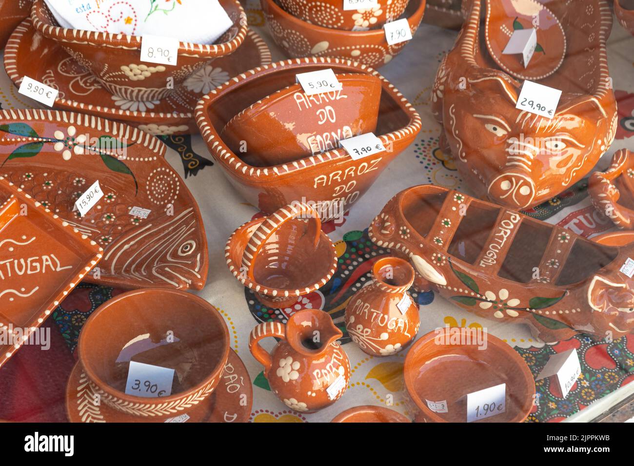 Souvenirs Background with Portuguese brown ceramics Stock Photo - Alamy