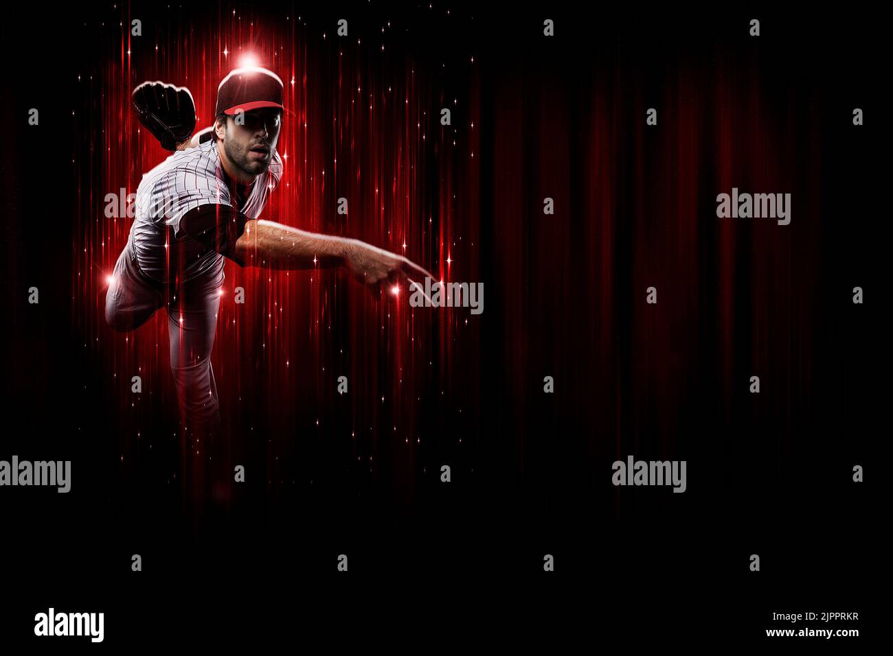 Baseball Player, pitcher, in a red uniform, on a black and red ...