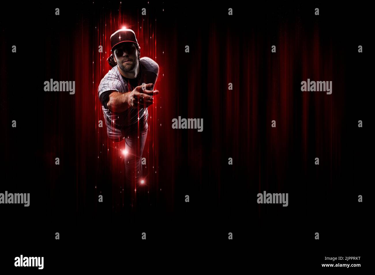 Baseball Player, pitcher, in a red uniform, on a black and red ...