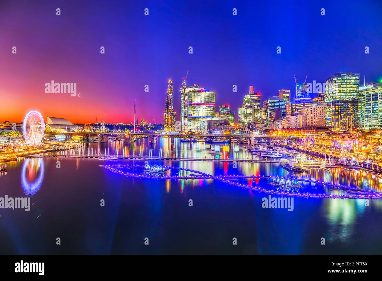 Bright colourful scenic sunset over City of Sydney Darling harbour ...