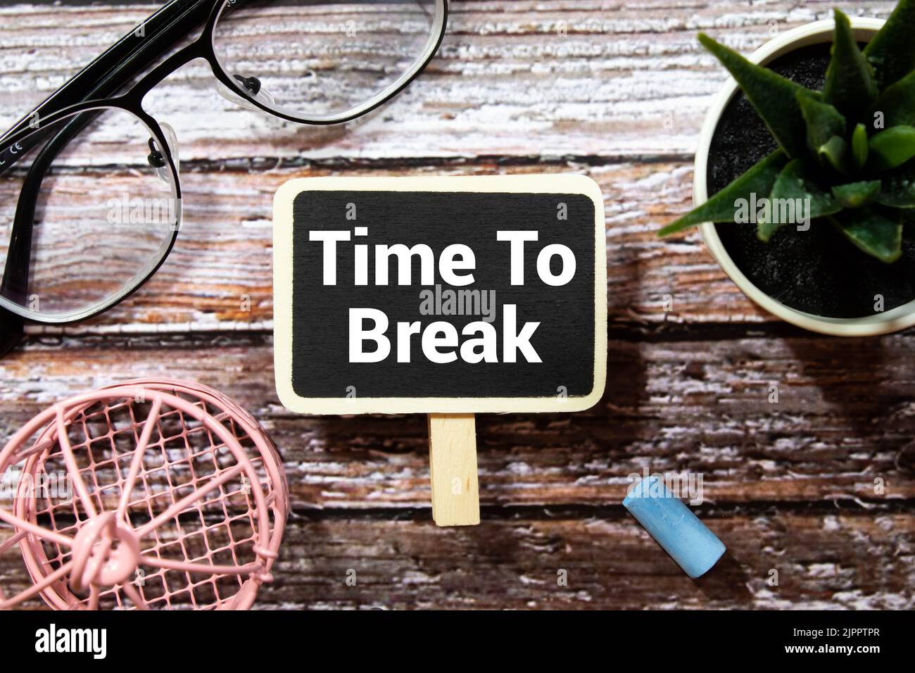 Time to Break Text written on notebook page, pencil on the right ...