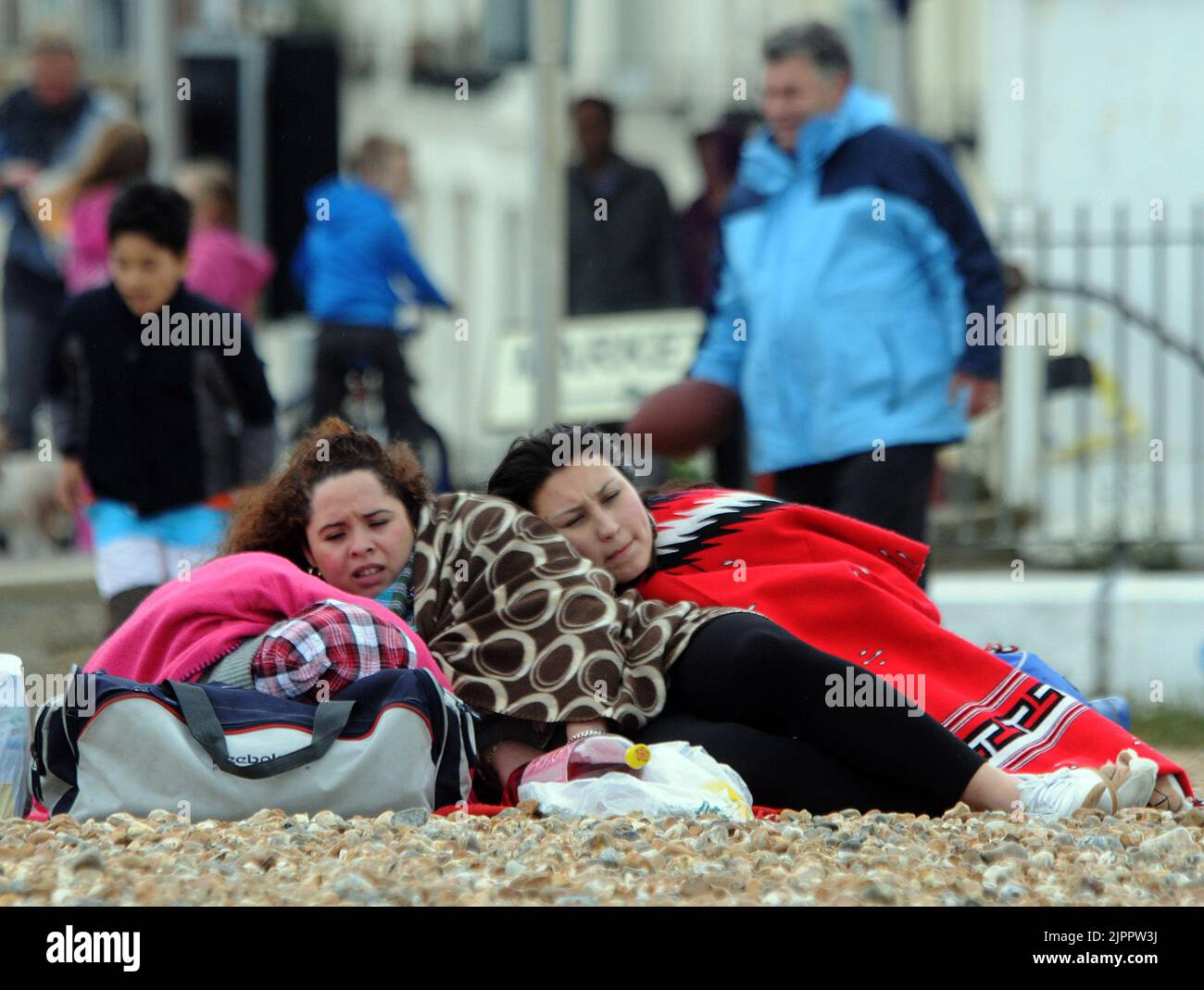 WRAPPED UP AGAINST THE COLD AND WIND DAY TRIPPERS TO SOUTHSEA ...
