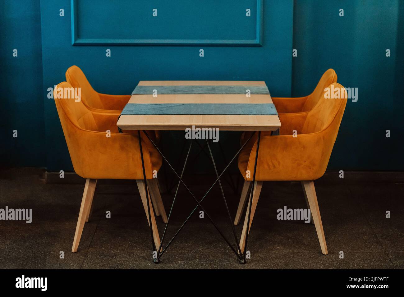 Modern furniture with a matte wall in the background. Selective focus ...