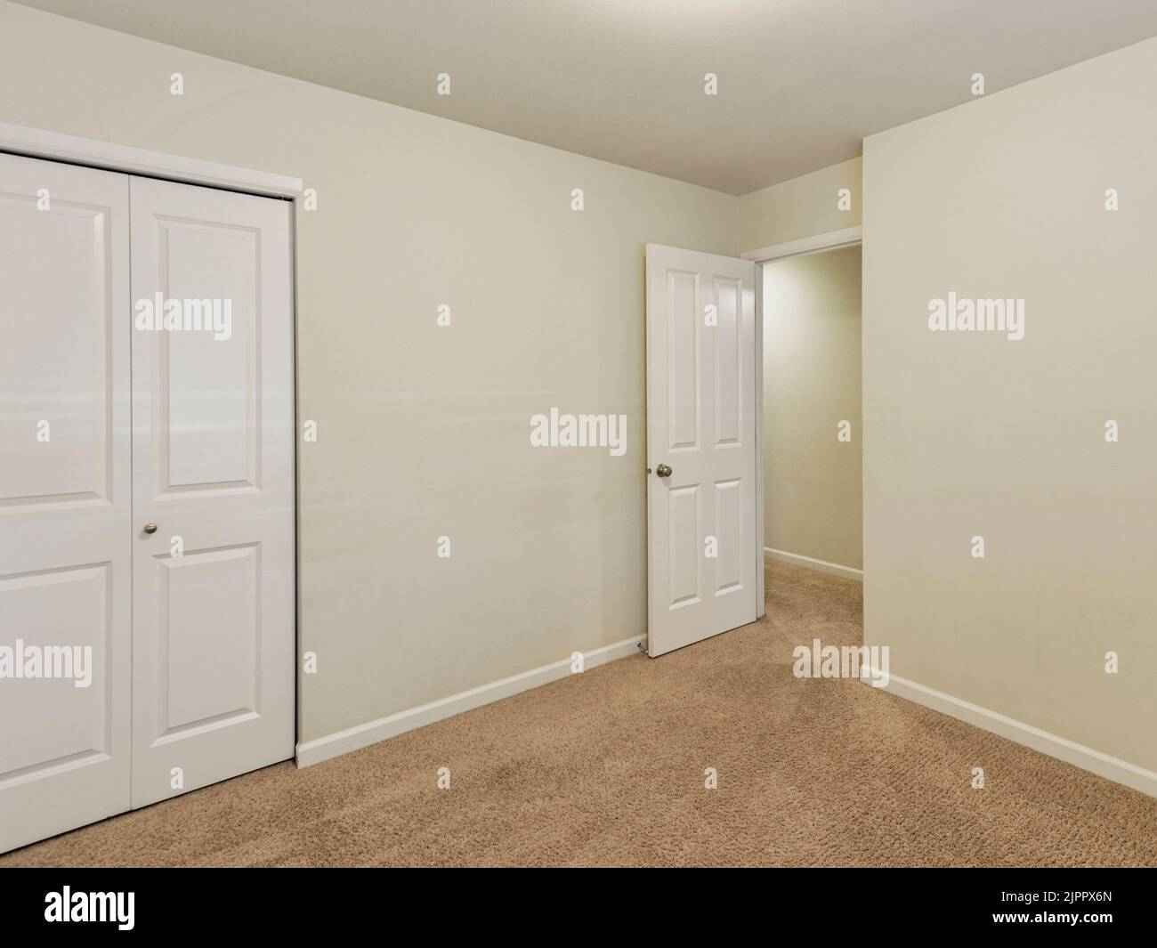 Modern residential empty bedroom interior Stock Photo - Alamy