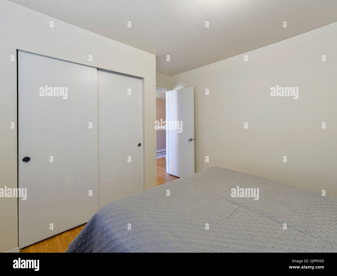 Modern residential empty bedroom interior Stock Photo - Alamy