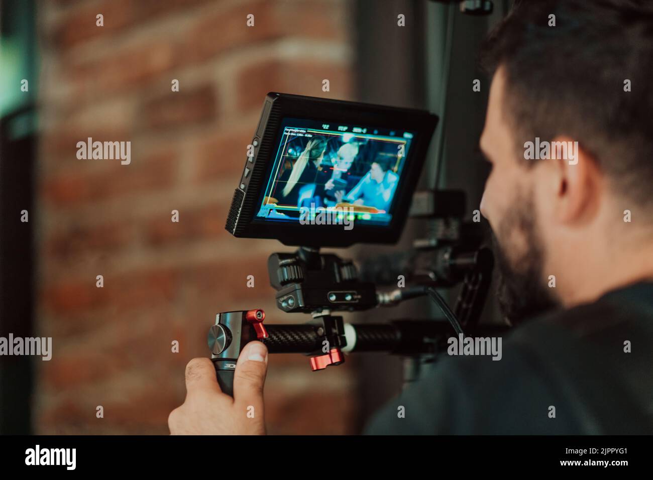 Taking movie professional camcorder hi-res stock photography and images ...