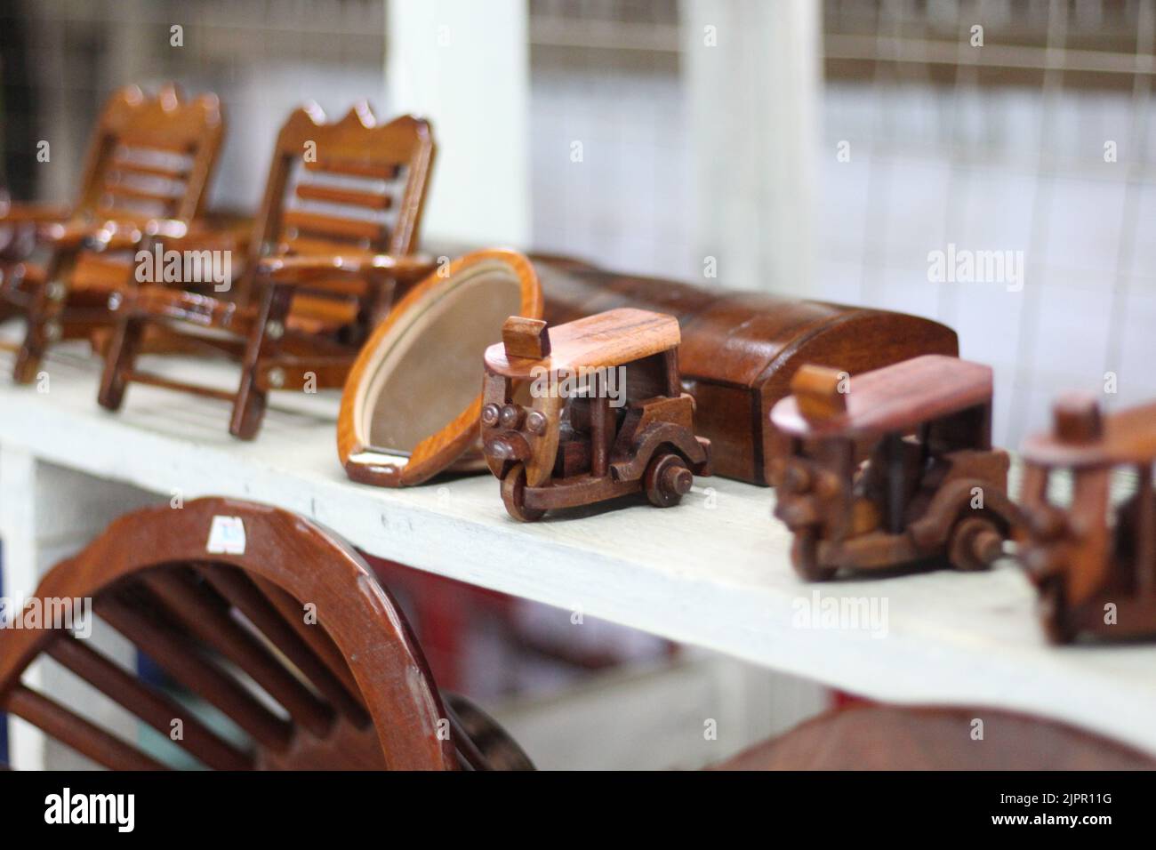 A closeup of a display of miniature wooden crafts Stock Photo - Alamy