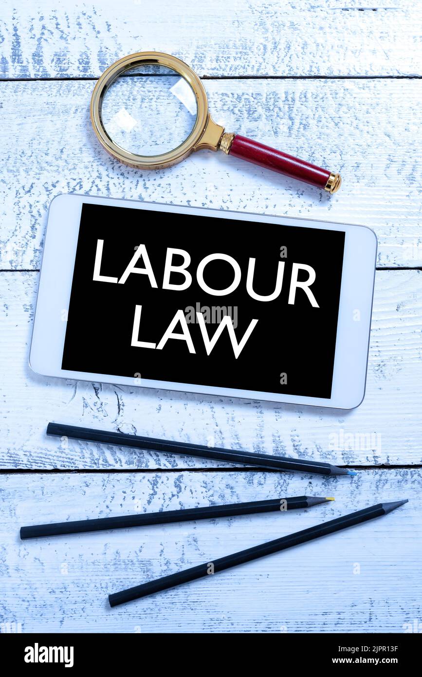 Hand writing sign Labour Law, Conceptual photo Rules implemented by the ...