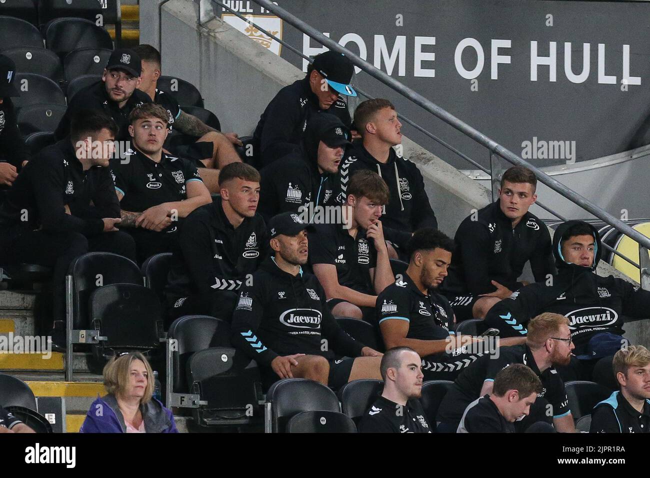 Hull FC players watch from the stands Stock Photo - Alamy