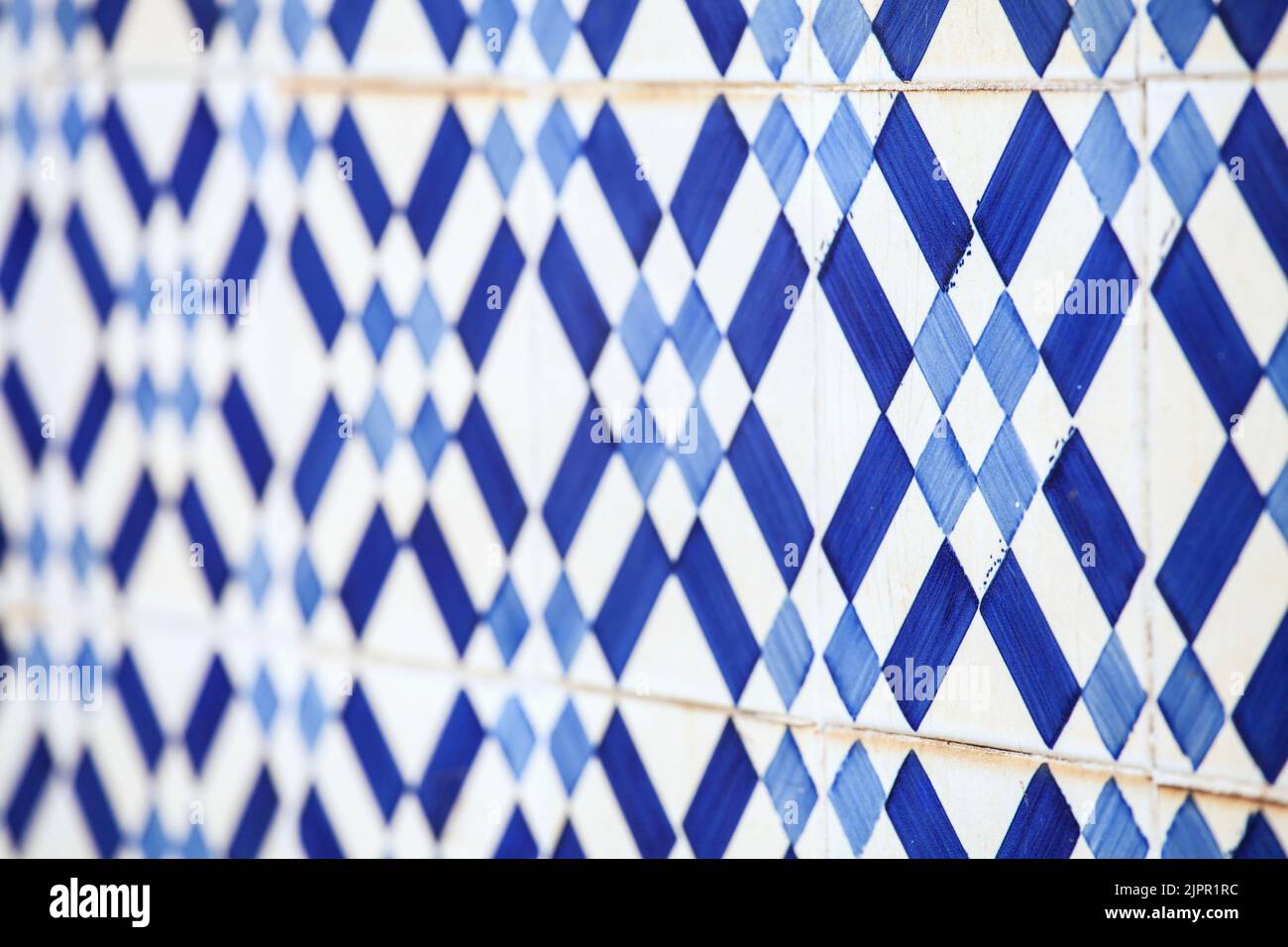 A blue and white tiled pattern wall. Can be used as a background Stock ...