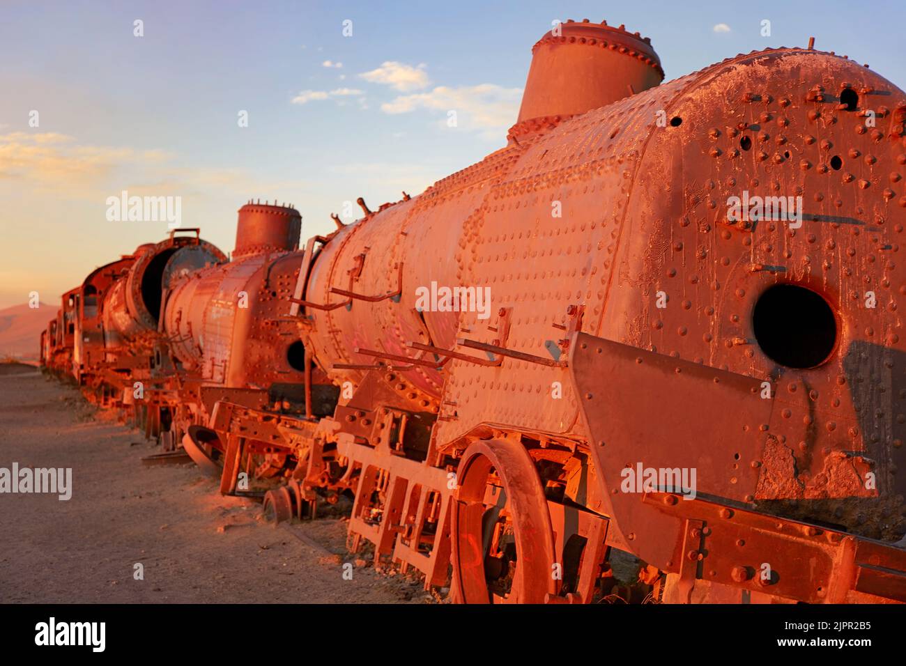 The Uyuni train cemetery at sunset, Potosi, Bolivia Stock Photo - Alamy