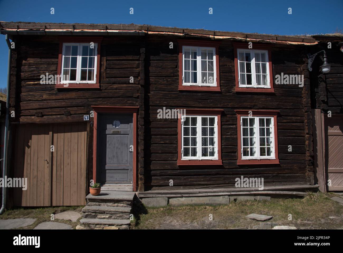 Røros is a copper mining town with historic wooden buildings in the ...
