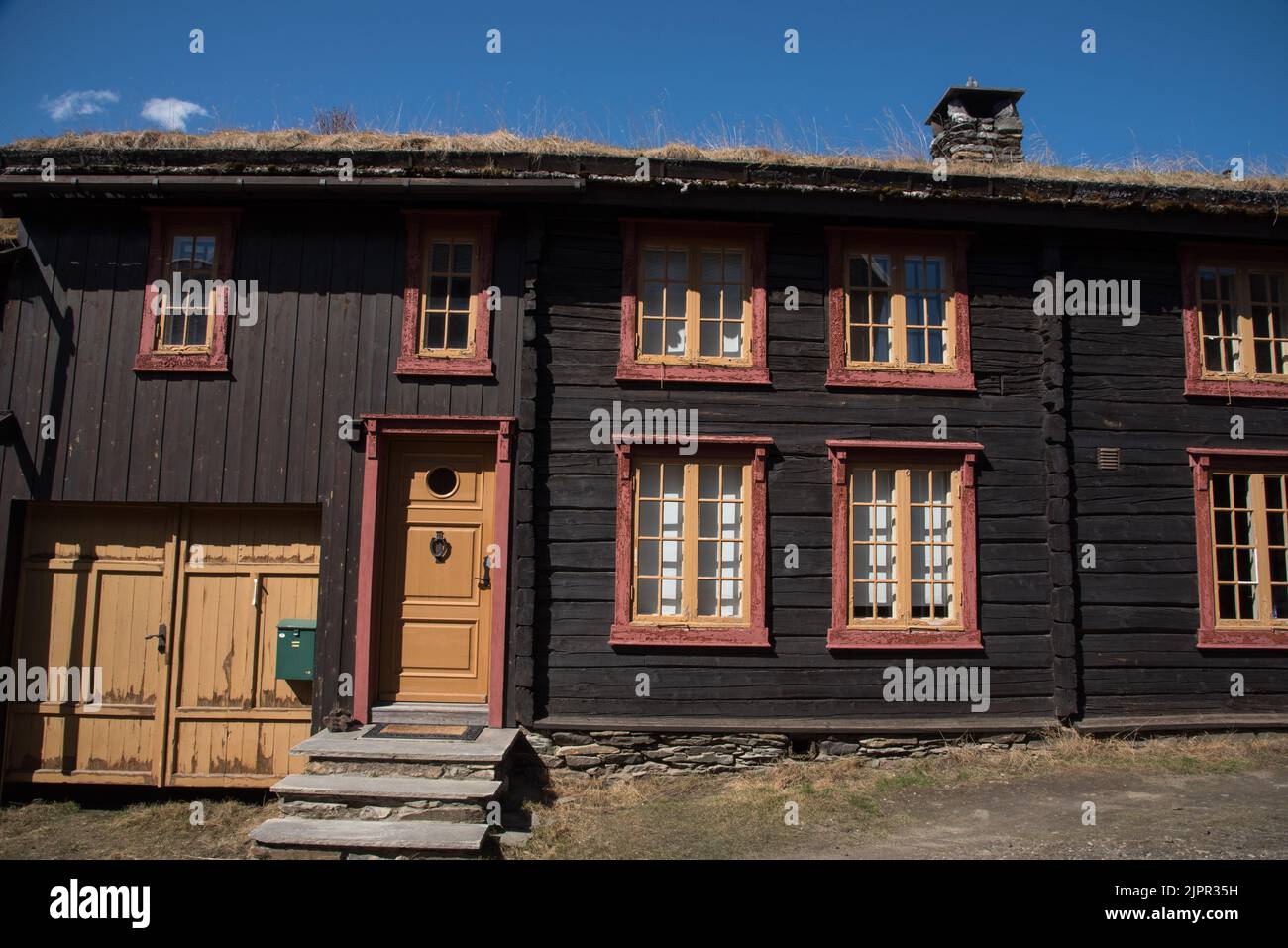 Røros is a copper mining town with historic wooden buildings in the ...