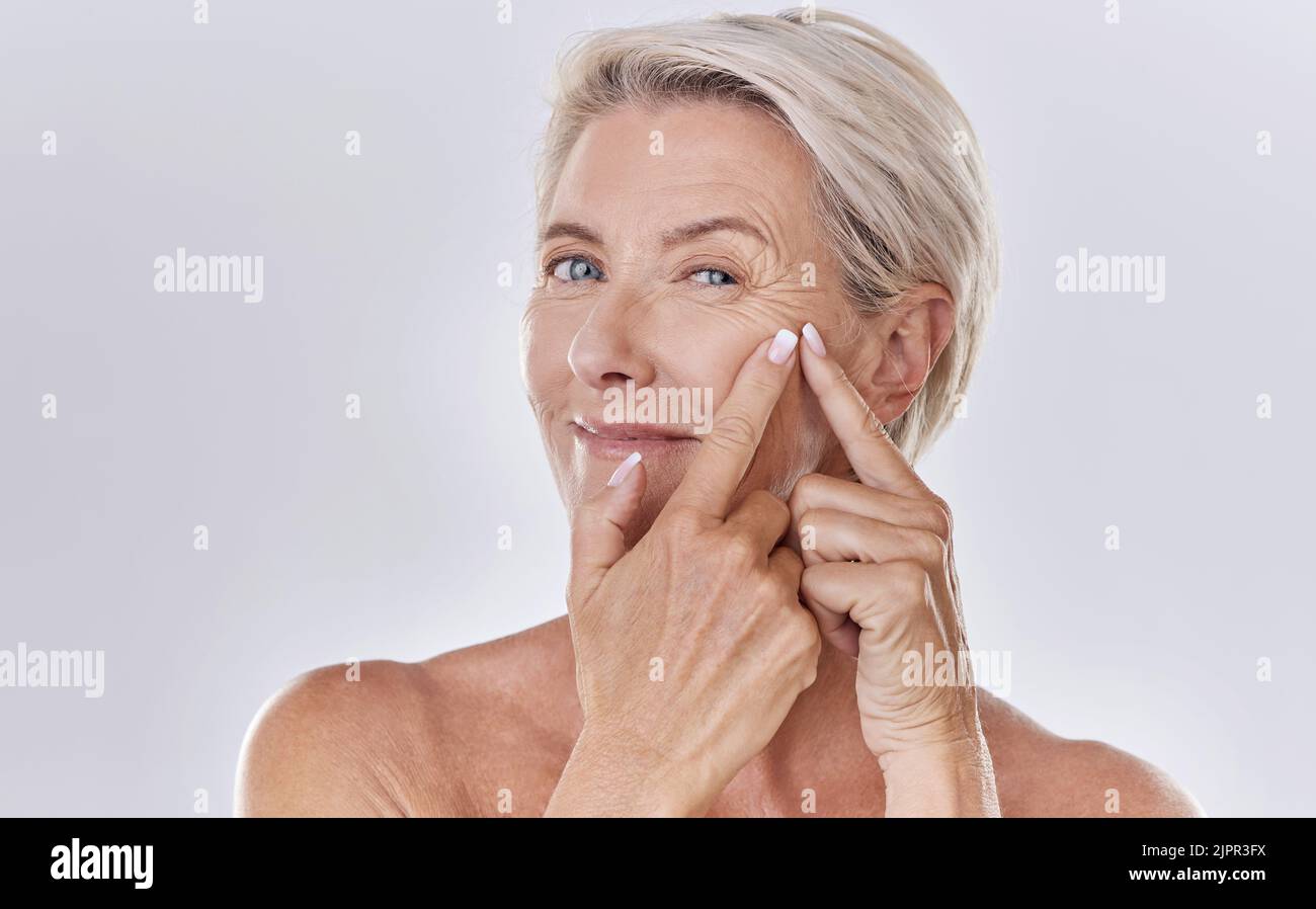 Acne or pimple popping female or woman after night face skincare beauty ...