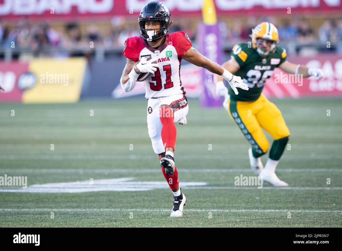 August 19, 2022: Ottawa Redblacks Devonte Williams (31) runs with the ...