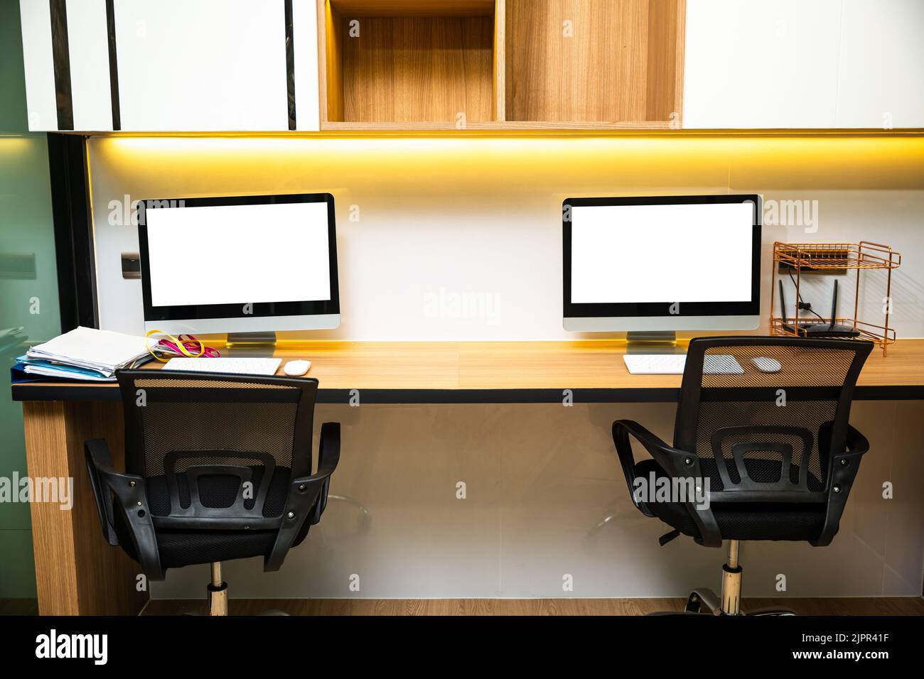 Workspace desk. Computer desktop blank screen in front of window in ...