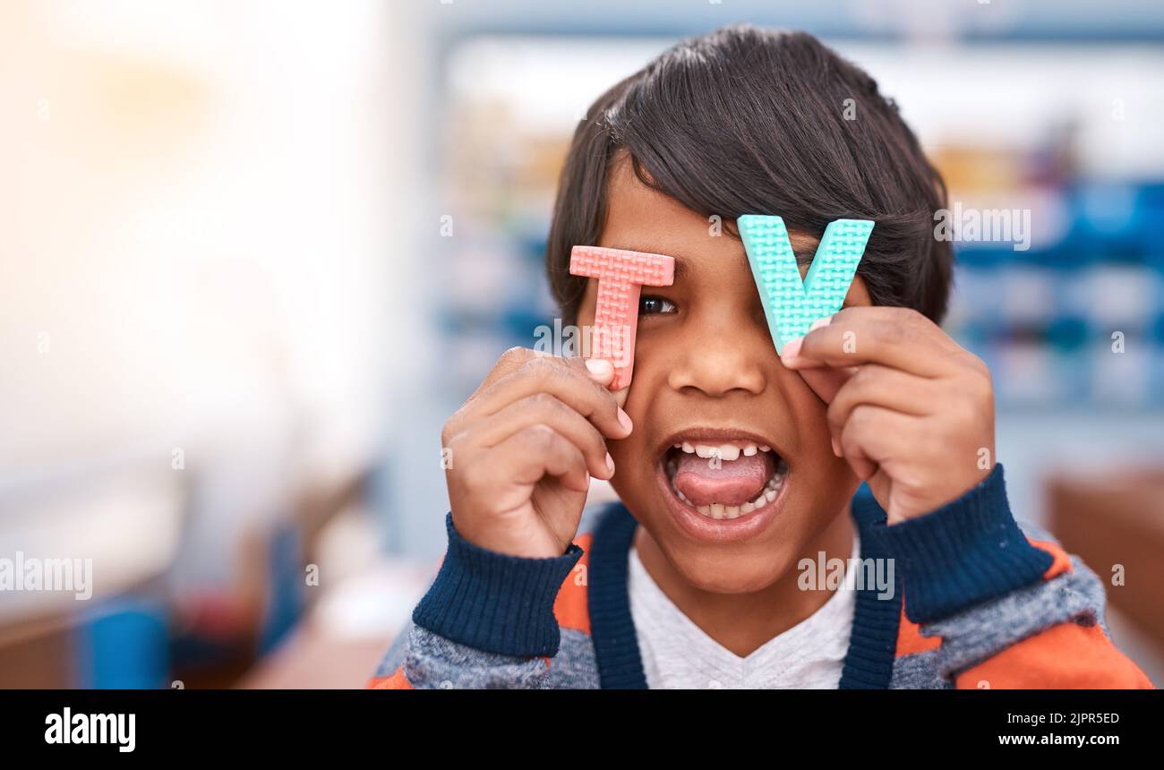 Mom always says I watch too much TV. a cheerful elementary school kid ...