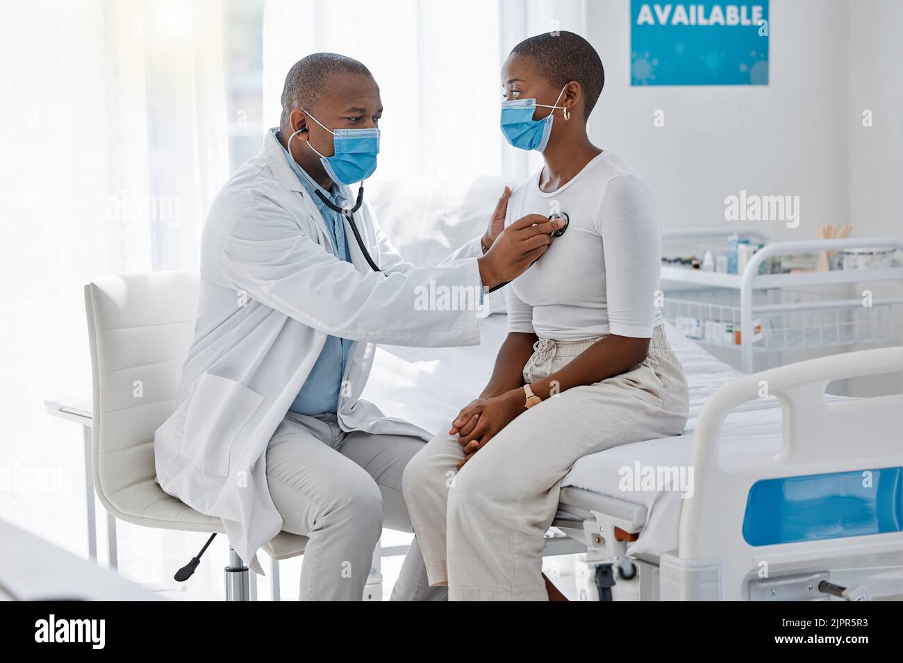 Consulting doctor, stethoscope and covid patient in medical ...