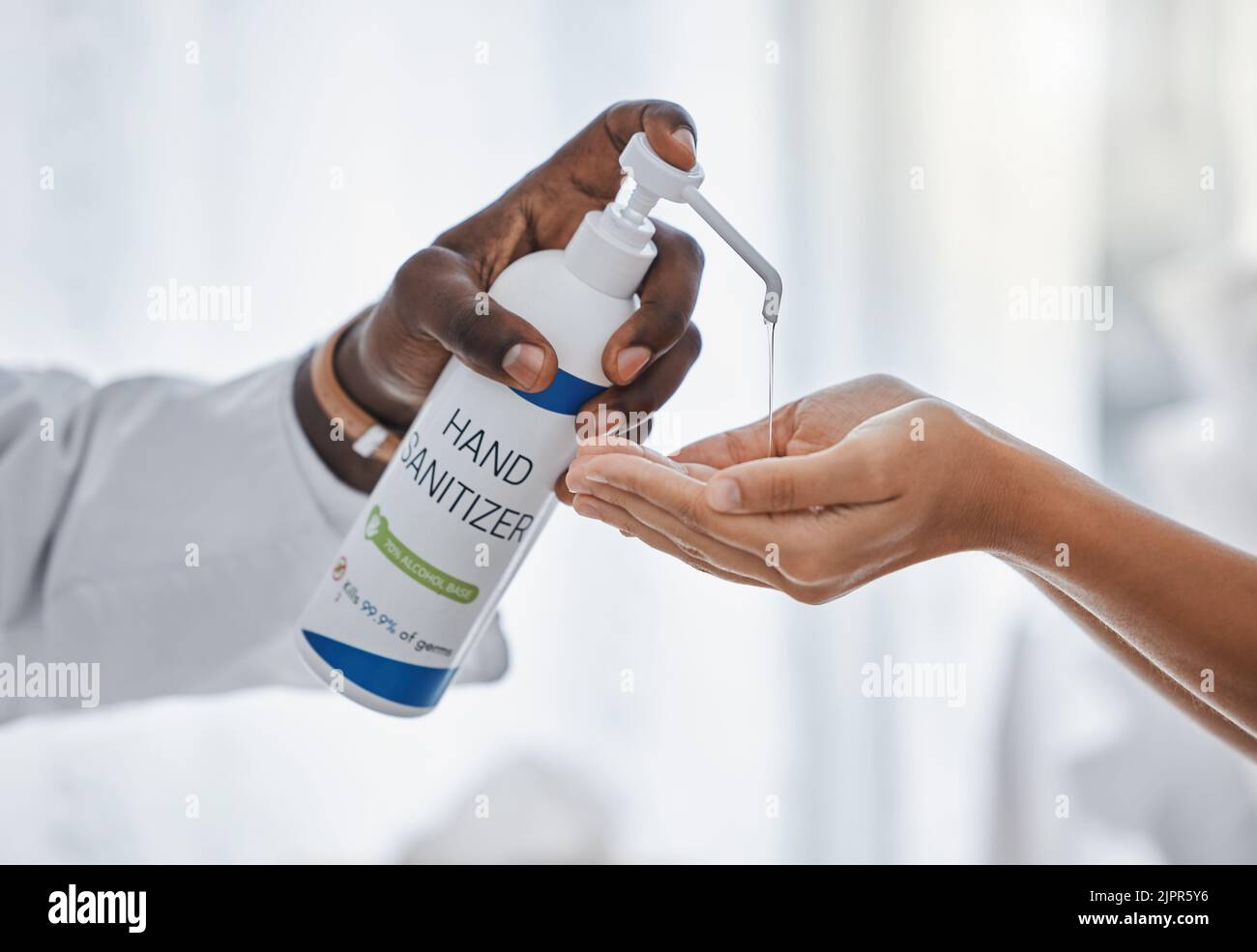 Doctor apply hand sanitizer cleaning, hygiene and covid procedures ...