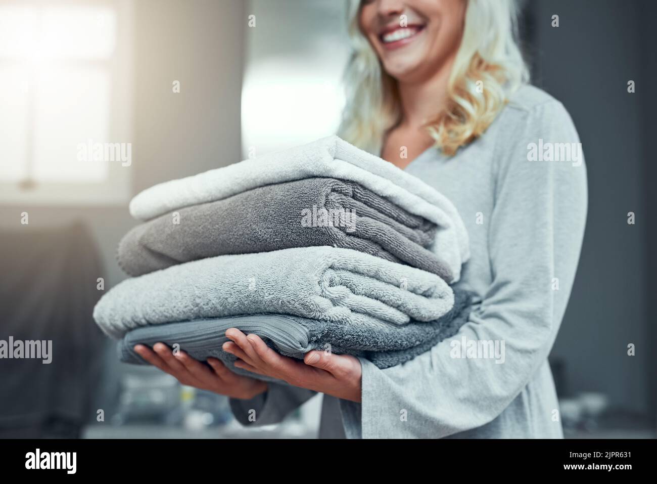 One stack of fresh laundry coming right up. Closeup shot of an ...