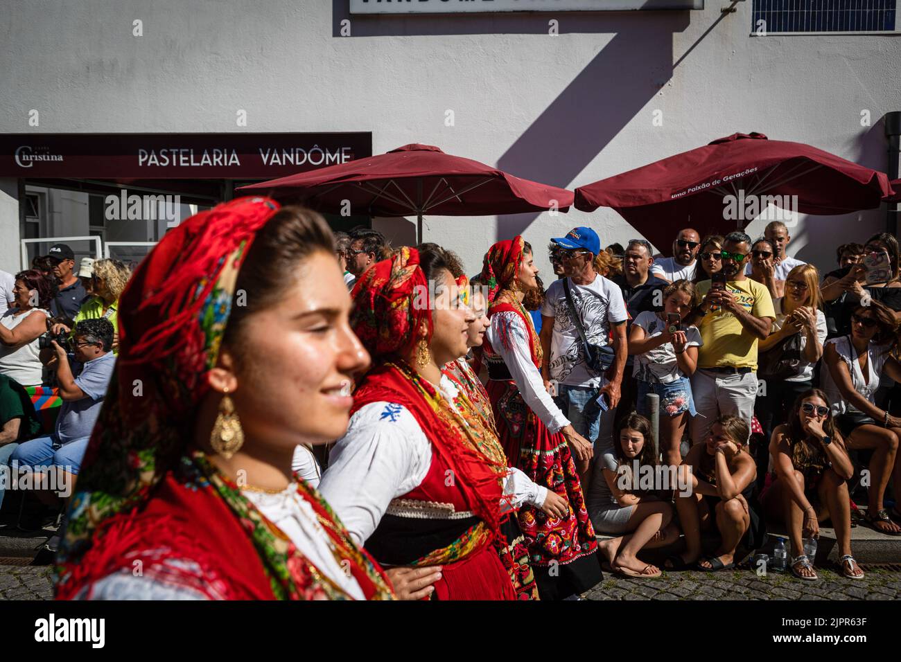 The crowd watches the parade in awe and with a sense of pride, it's ...