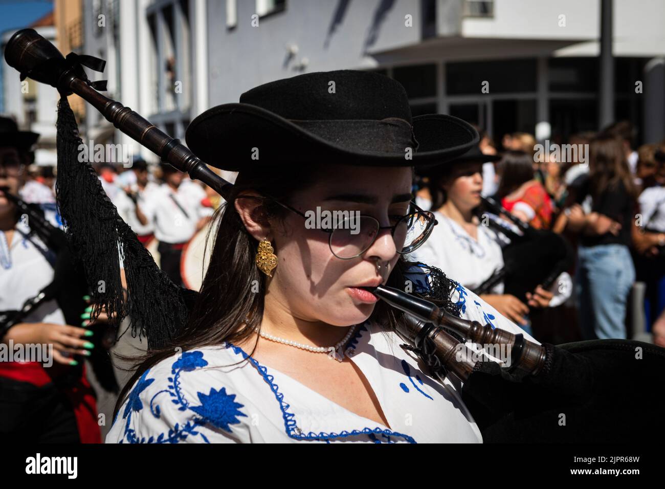 Portrait of a female bag-piper. More than half a thousand women ...