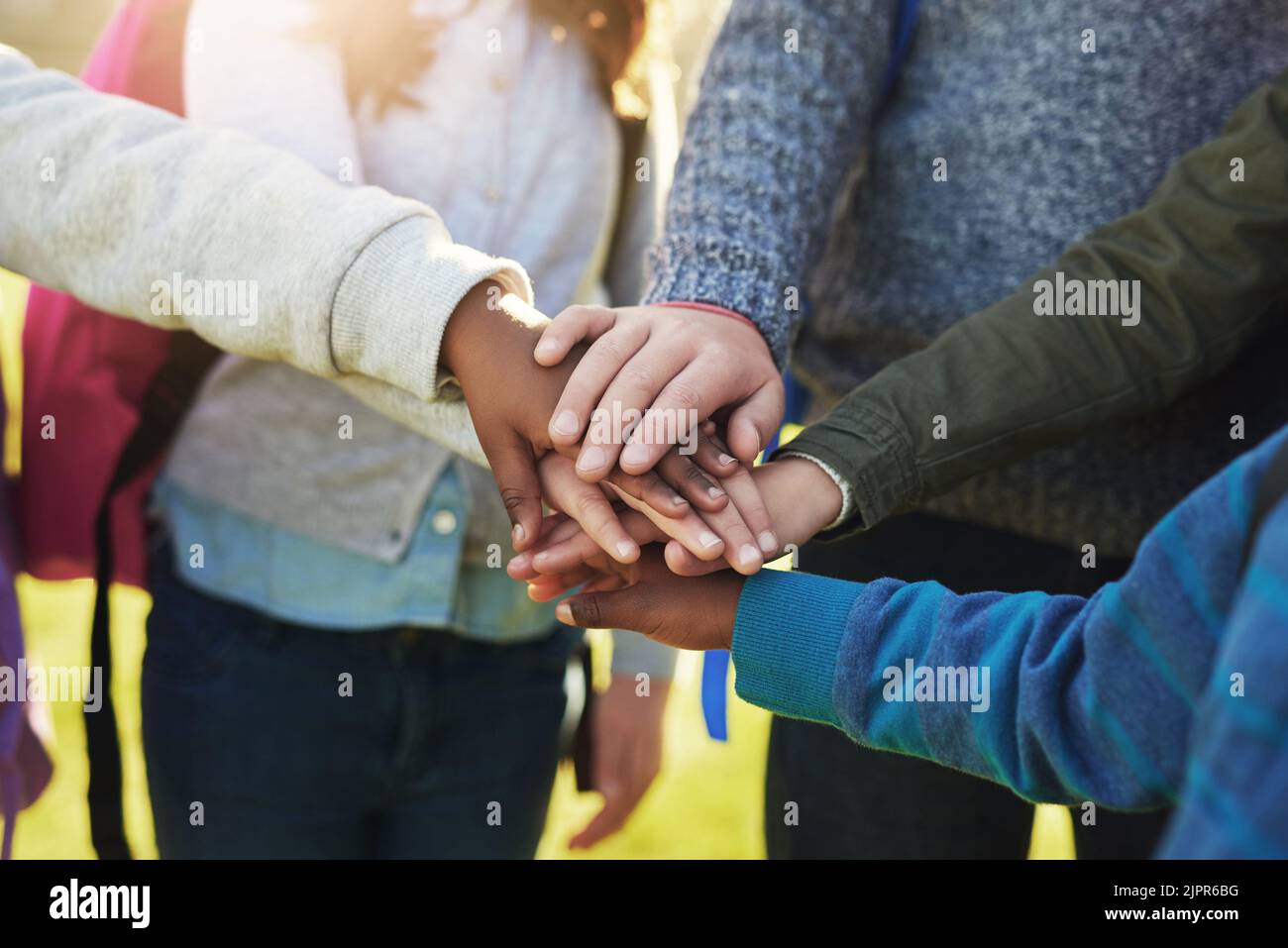 Were in this together. a group of unrecognizable elementary school kids ...