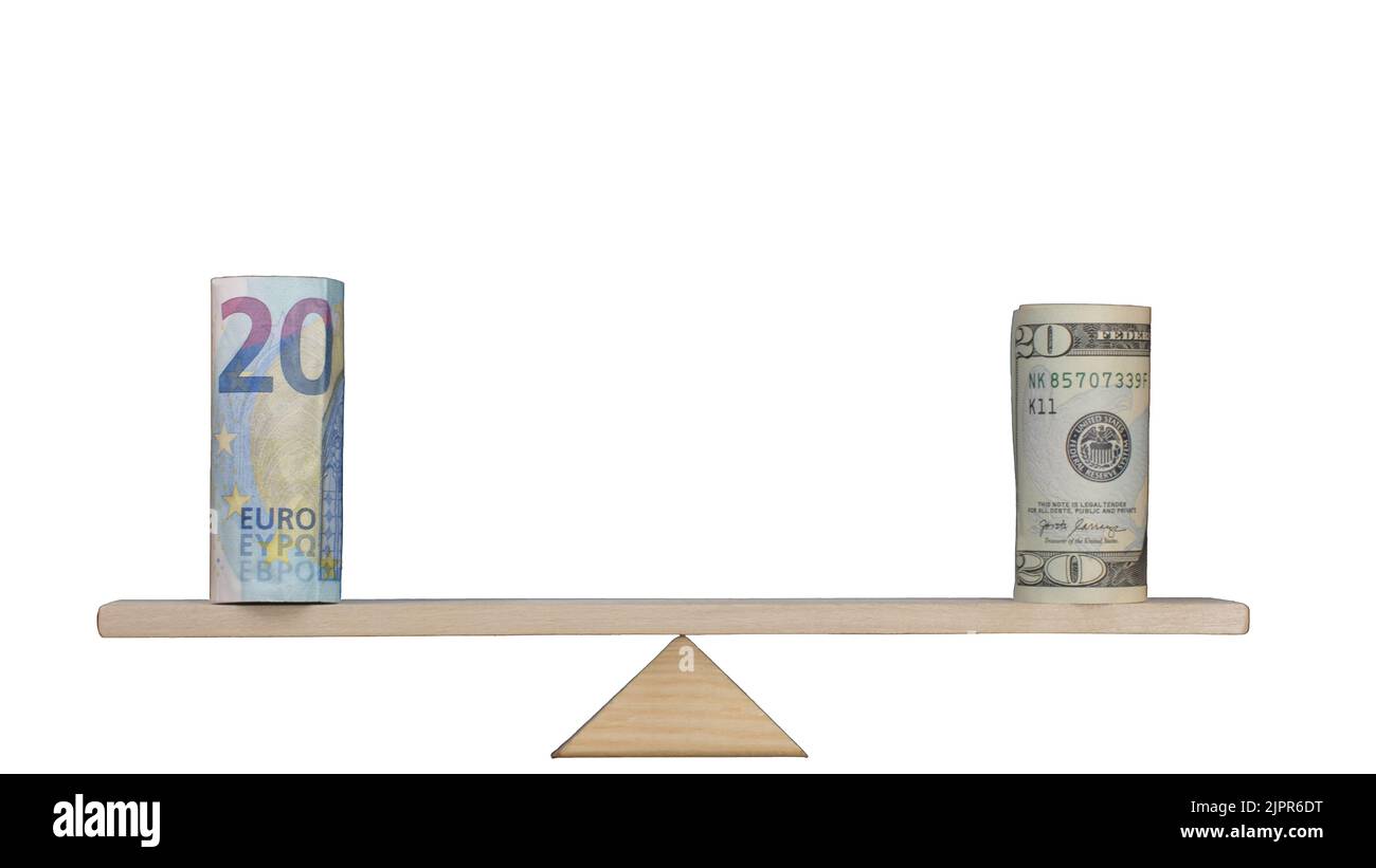 Parity in value of Euro and US Dollar equally balanced on a scale Stock ...
