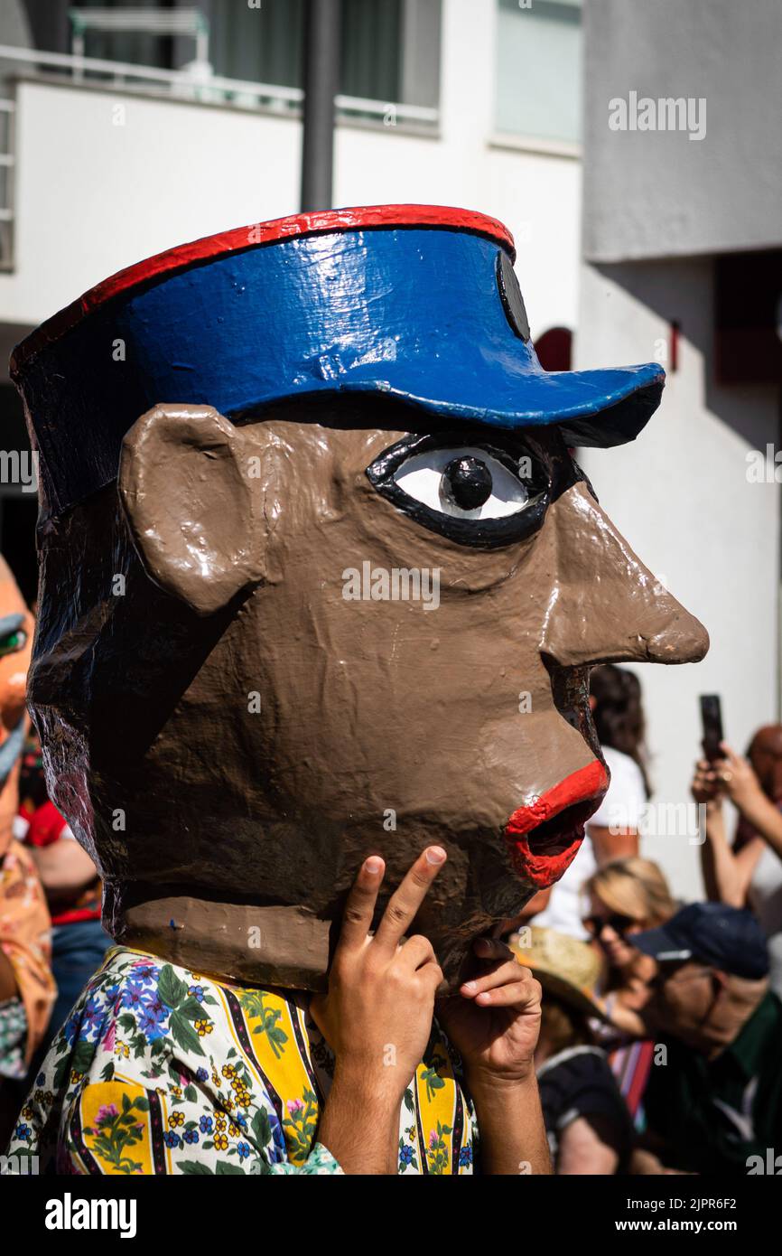 A portrait of a big-headed puppet. More than half a thousand women ...