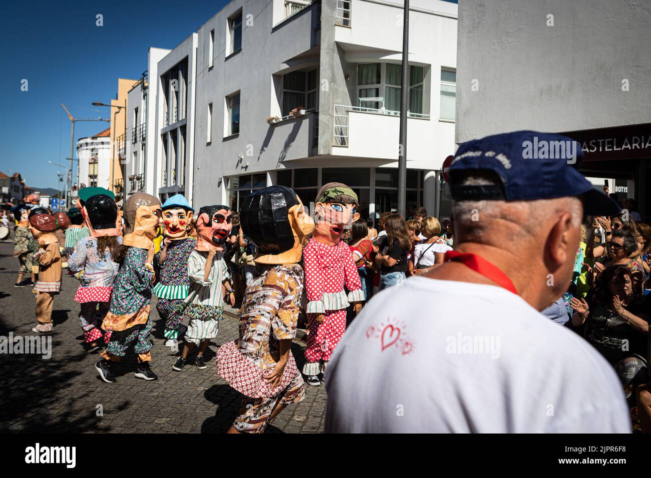 Giants and Big-headed Puppets dance around the streets opening the ...