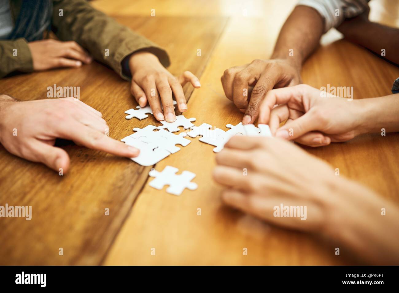 Teamwork gets the job done. High angle shot of a group of ...