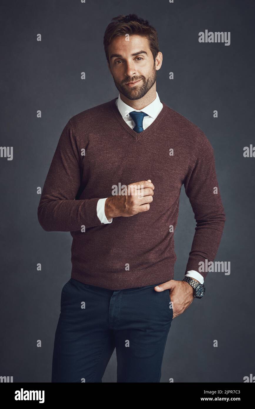 Power poses. Studio portrait of a stylishly dressed young man posing ...