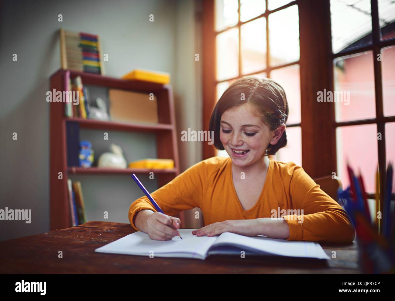 Ill get this homework done in a flash. a little girl doing homework ...
