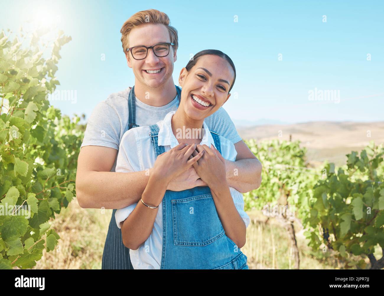 In love, countryside and farmer couple enjoying grape vine plant growth ...