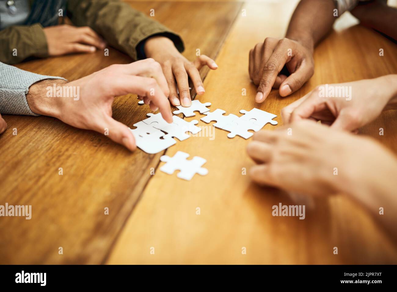 Teamwork gets the job done. High angle shot of a group of ...