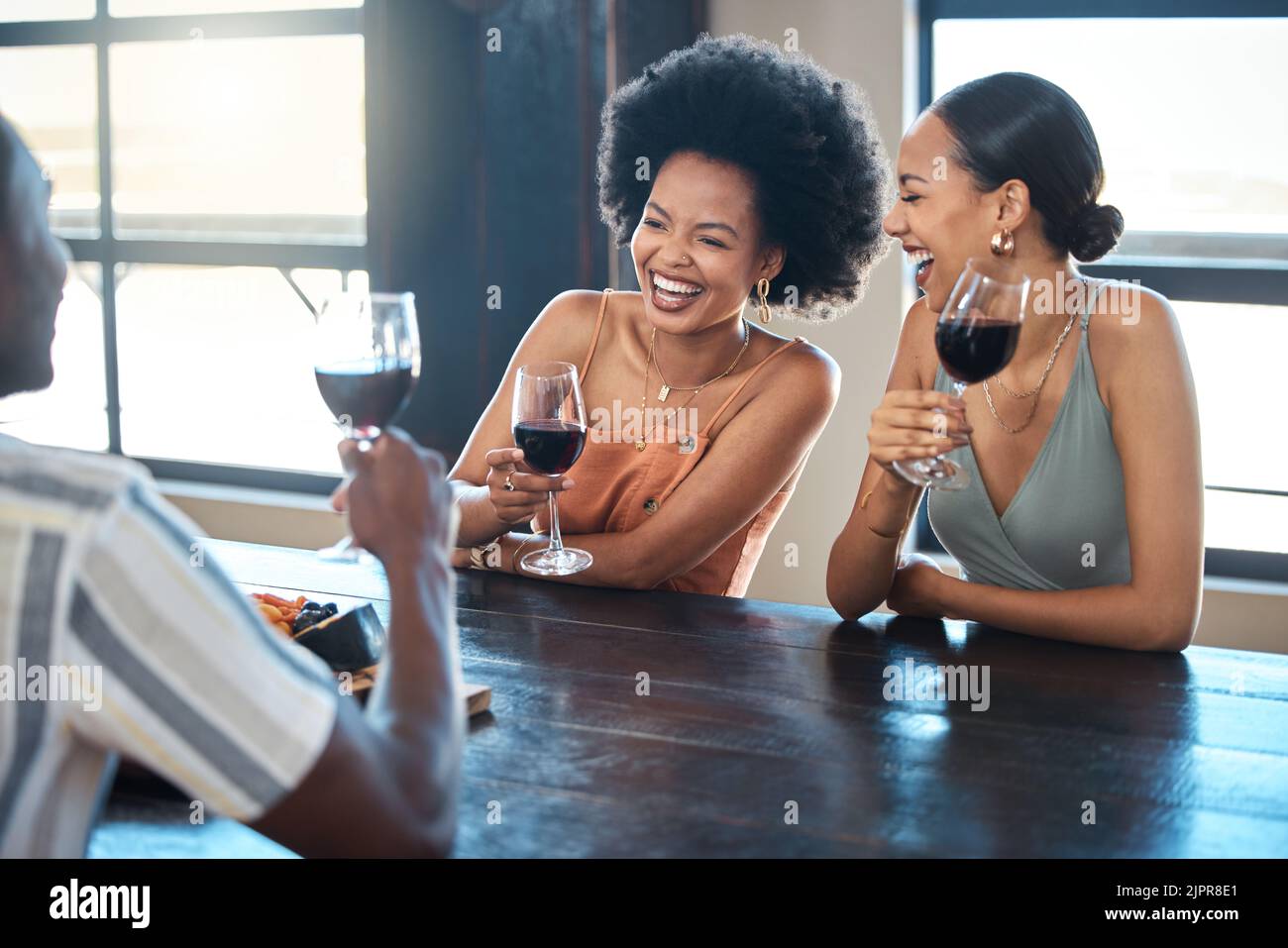 Friendship, fun and celebration with a happy group bonding and drinking ...