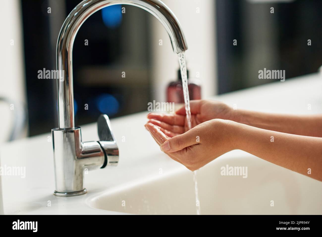 Woman washing hands rid hi-res stock photography and images - Alamy