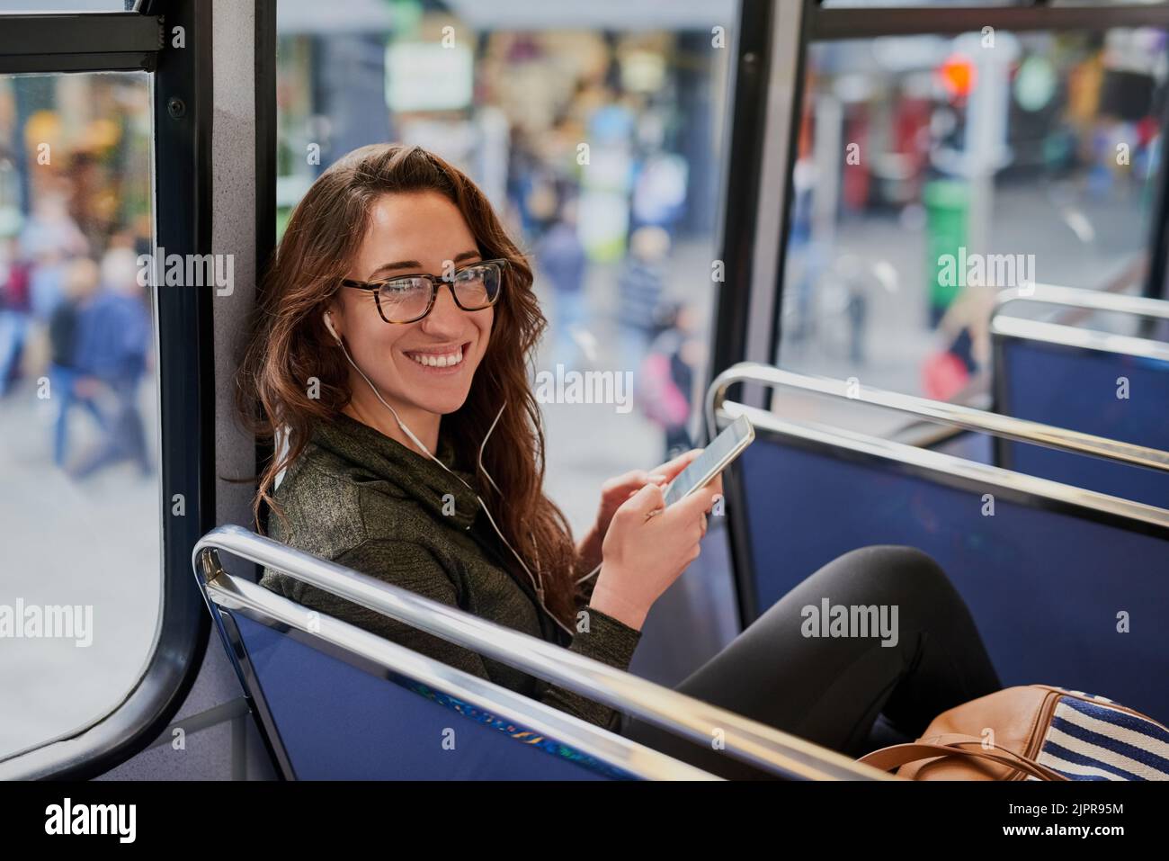 Why drive when you can take the bus. High angle portrait of an ...