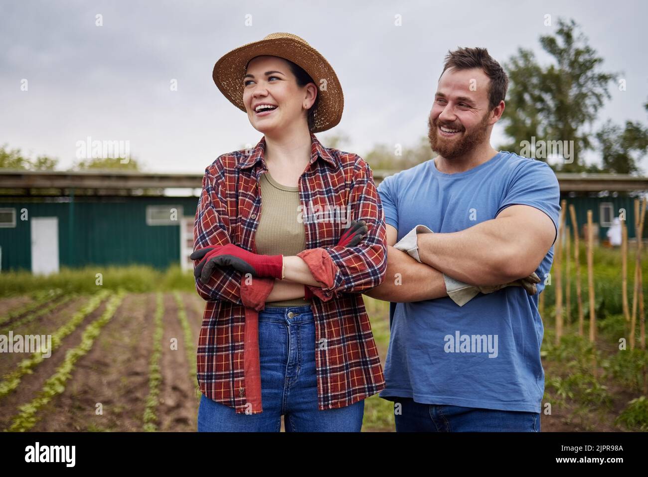 Sustainability, agriculture and farmer couple on a farm growing ...