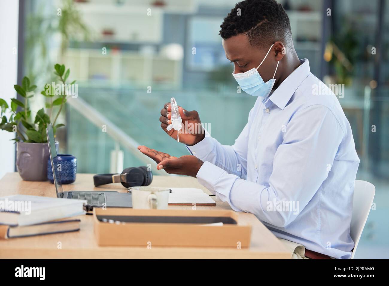 Hygiene, compliance and covid rules at work with a business man ...