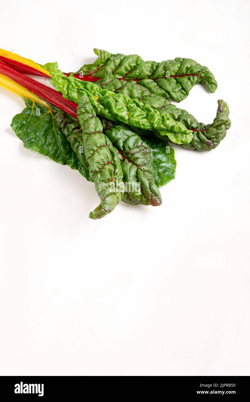 Raw chard on light background. Highly nutritious leaves. Popular ...