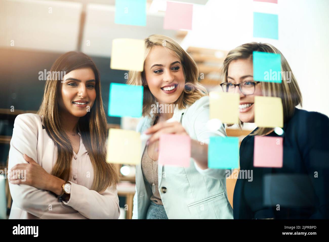 Female leader, team manager and boss planning with her colleagues on a ...