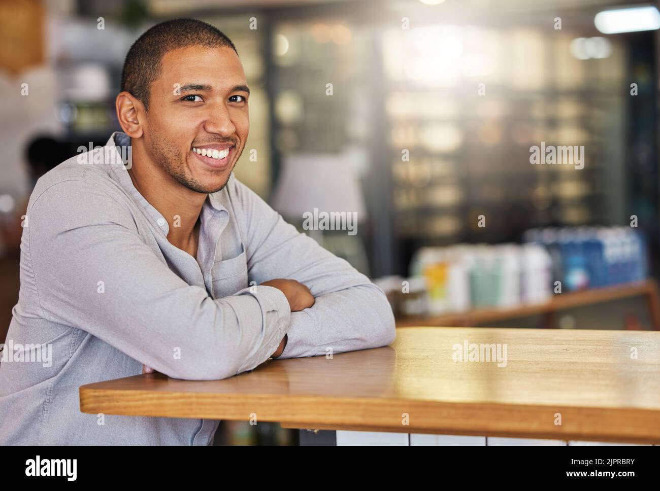 Entrepreneur or small business owner of cafe or coffee shop at counter ...