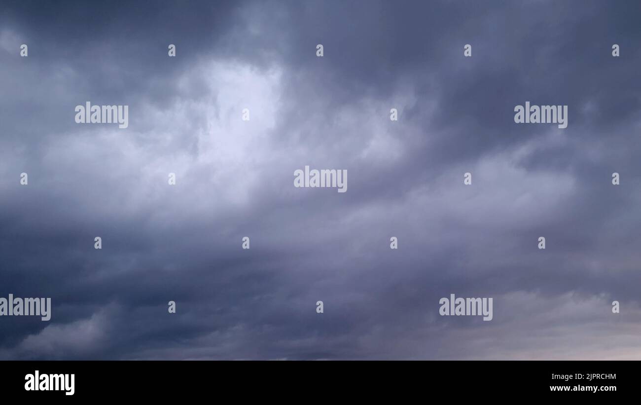 massive grey and blue overcast clouds background for weather forecast ...