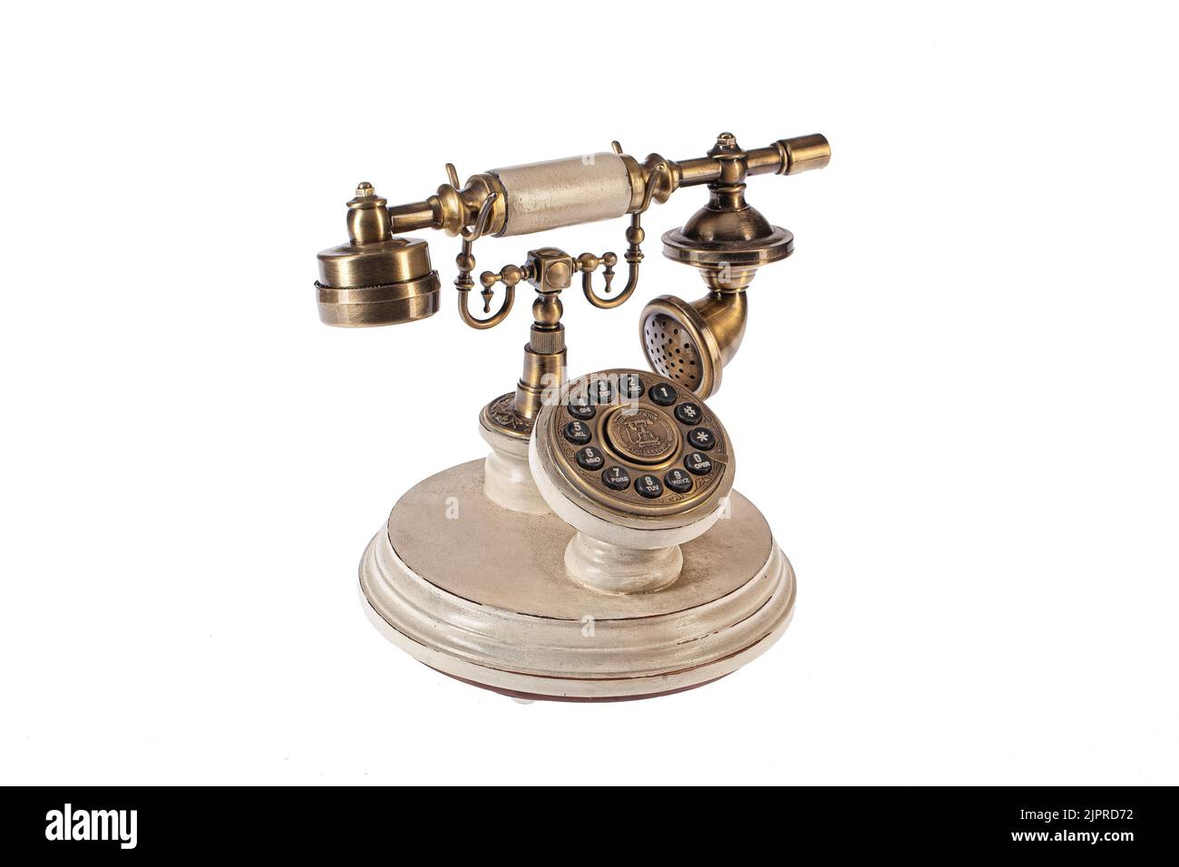 Old telephone on an isolated studio background Stock Photo - Alamy