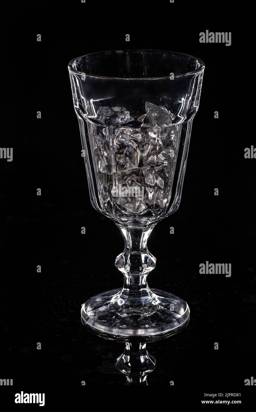 Glass with crystals of ice on a glass background Stock Photo - Alamy