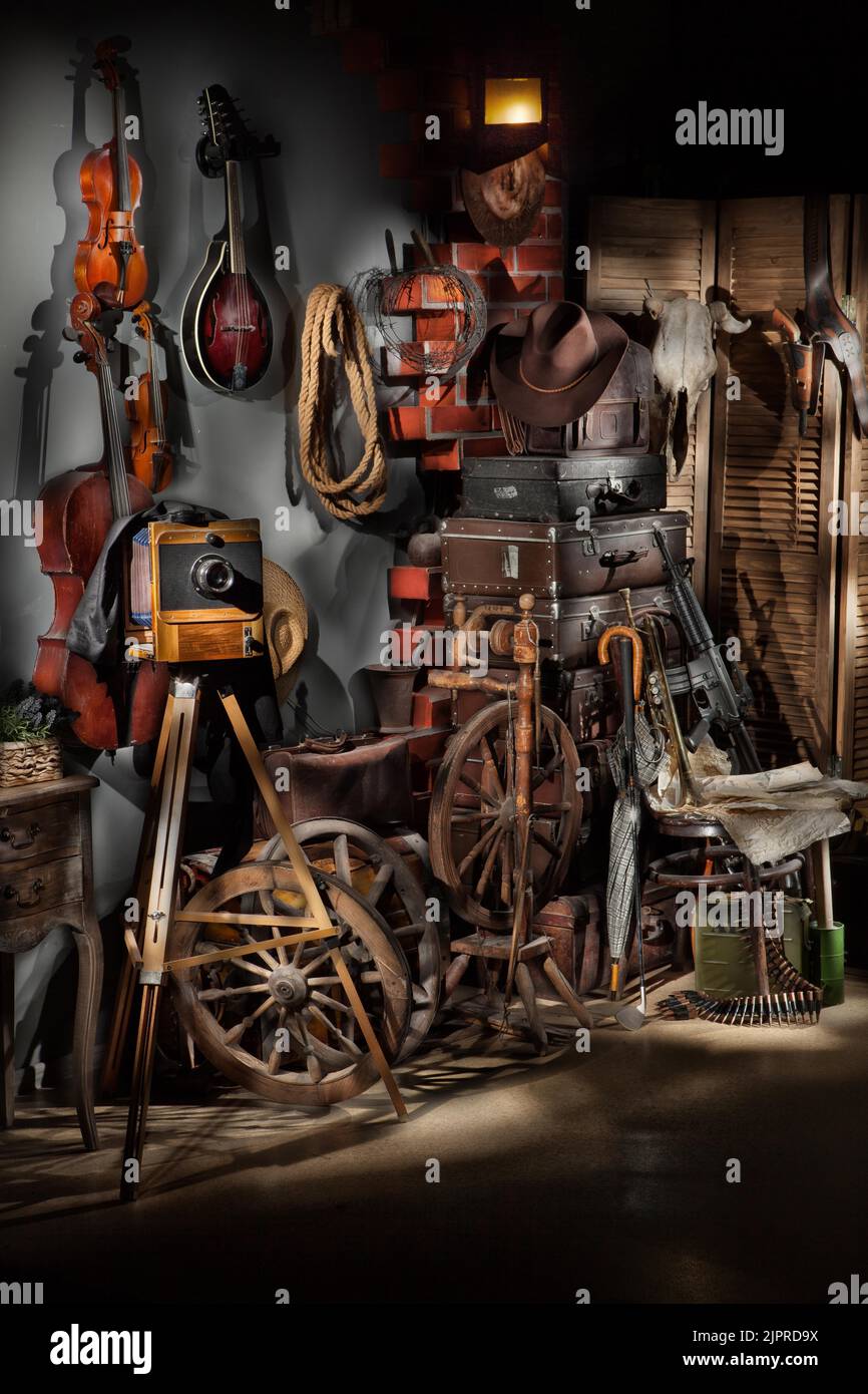 Still life with old musical instruments, hats, camera and wheels Stock ...