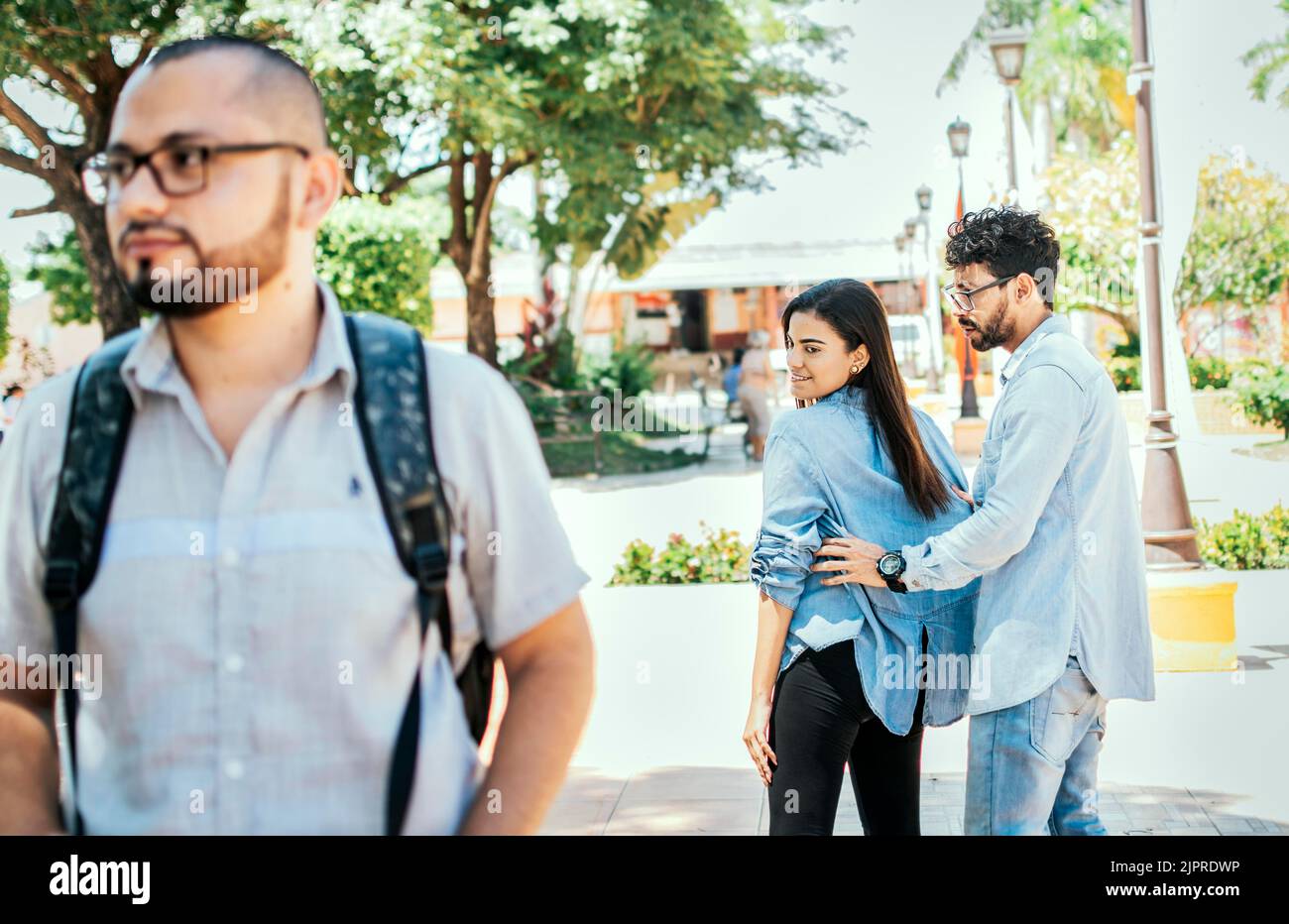 Unfaithful girlfriend looking at another man on the street, Unfaithful ...